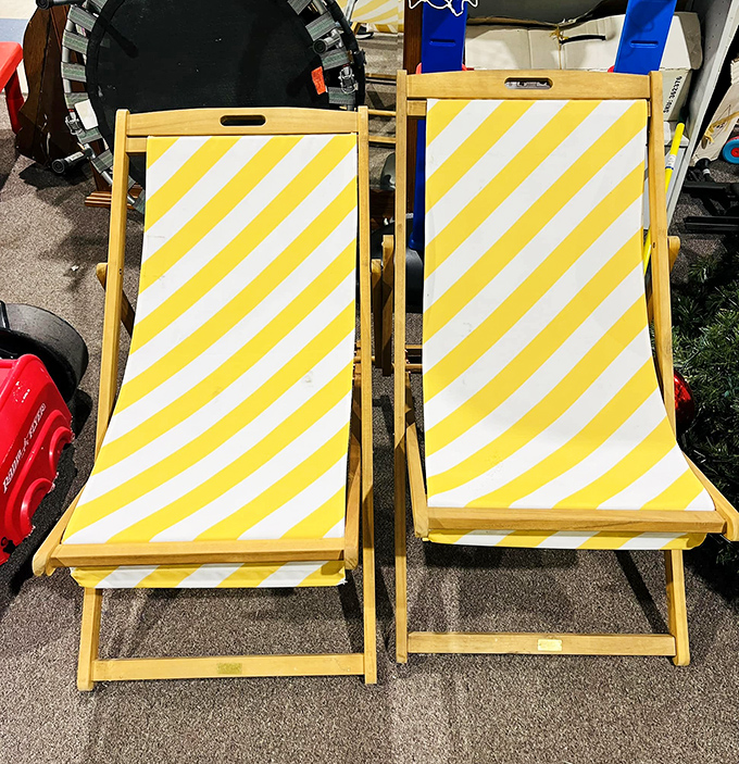 Sunny yellow beach chairs waiting for their second act&mdash;perfect for backyard lounging or impromptu performances of "Beach Blanket Bingo."