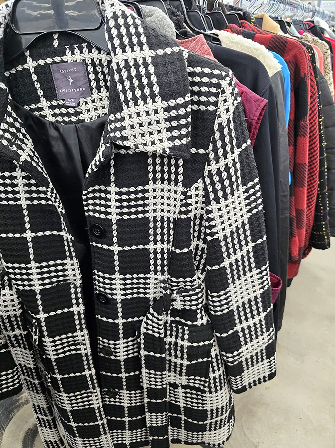 Fashion time travel at its finest. That black and white plaid blazer could take you from job interview to jazz club without missing a beat.