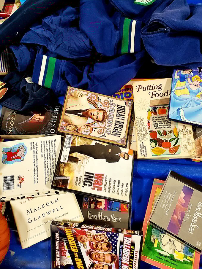 Books and vintage clothing mingle like old friends at a reunion nobody planned but everyone needed.