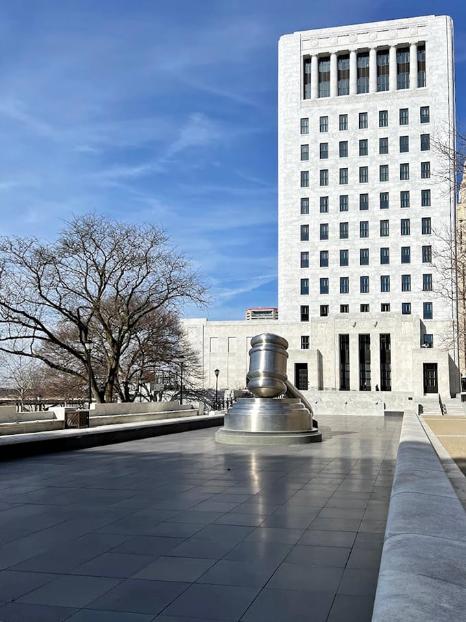 The Thomas J. Moyer Ohio Judicial Center provides a stately backdrop for the gavel, like a dignified judge watching over its oversized courtroom accessory.