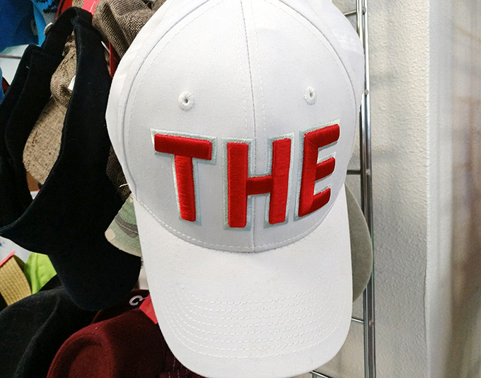 Just "THE" hat&mdash;because sometimes simple statements make the boldest fashion declarations in a thrift store treasure hunt.