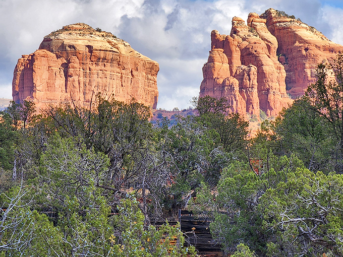 Cathedral Rock plays peekaboo through the trees. Like a geological celebrity, it knows its best angle and isn't afraid to flaunt it.