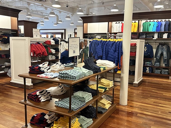 Perfectly folded stacks of clothing await their forever homes. Like a retail version of those satisfying cooking videos, but for your wardrobe.