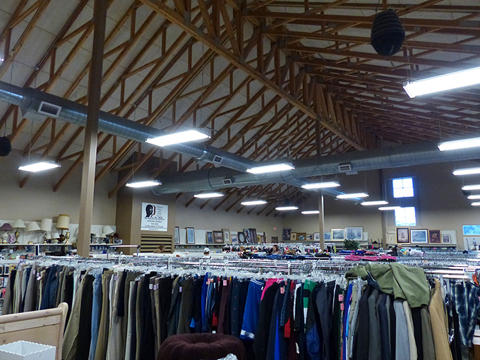 Rack after rack of carefully sorted clothing awaits, where designer labels hide among everyday basics at fraction-of-retail prices.