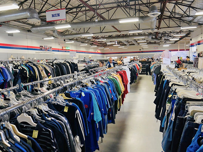 Endless racks of clothing stretch toward the horizon—a textile Grand Canyon where every garment has a story waiting to be continued.