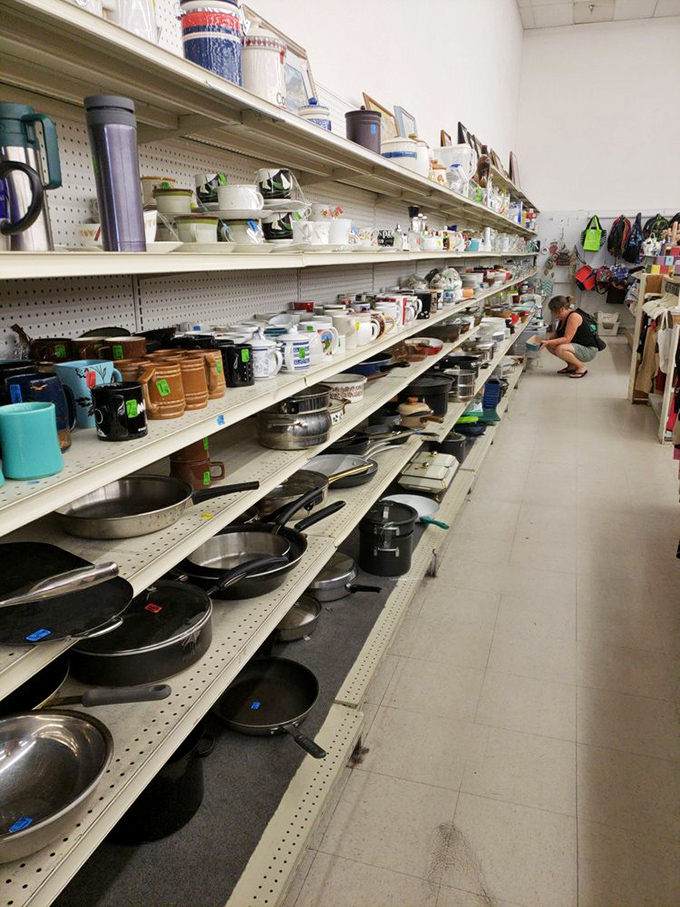 The cookware aisle: where seasoned cast iron pans with stories to tell wait for their next culinary adventure in a new kitchen.