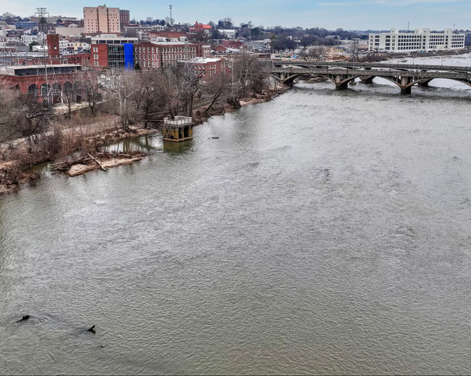 The Dan River flows gently through town, a liquid timeline connecting Danville's industrial past with its recreational present.