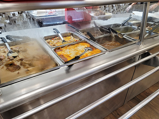 The steam rising from these trays isn't just vapor&mdash;it's aromatic poetry. Each compartment holds a different chapter in the Southern comfort food story.