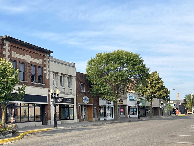 Downtown's historic buildings house local businesses rather than national chains, preserving the authentic character that big-city developers would pay millions to recreate.