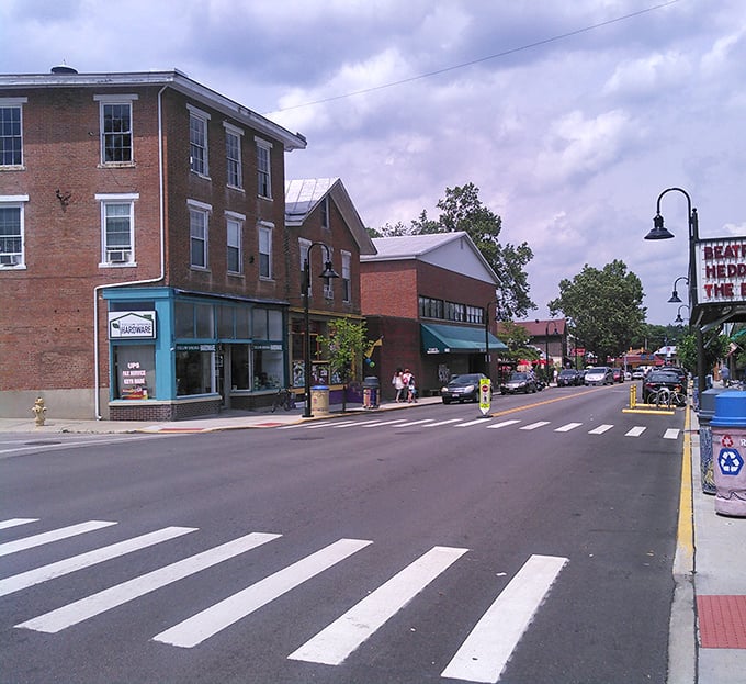 Brick buildings and crosswalks define downtown Yellow Springs, where pedestrians have the right of way and hurrying is gently discouraged by the town's relaxed vibe.