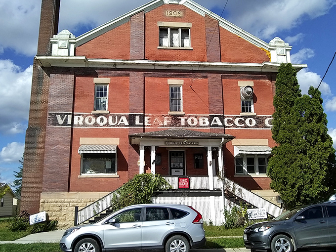 The Viroqua Leaf Tobacco building whispers stories of the region's agricultural past, now repurposed for a new chapter while preserving its distinctive red brick character.