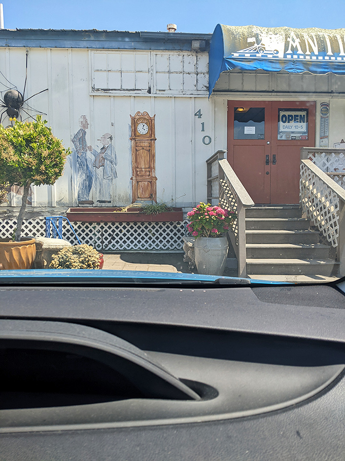 That orange door isn't just an entrance&mdash;it's a portal to the past. The painted grandfather clock on the wall is perpetually set to "adventure time."