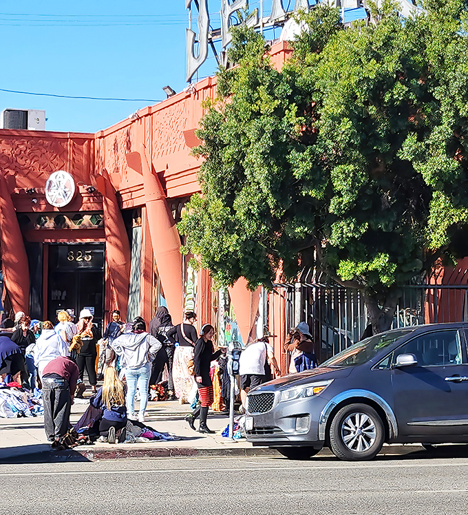 Sunday mornings bring the faithful to worship at the altar of secondhand style, where patience and sharp elbows are equally rewarded.