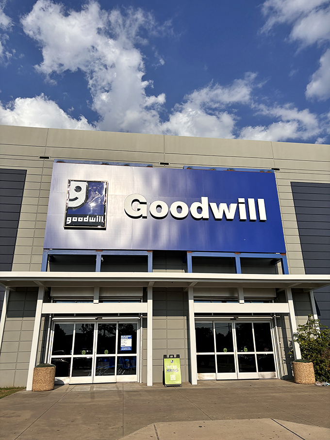 Those blue letters spell out more than just a store name—they're an invitation to a treasure hunt where yesterday's castoffs become tomorrow's conversation pieces.