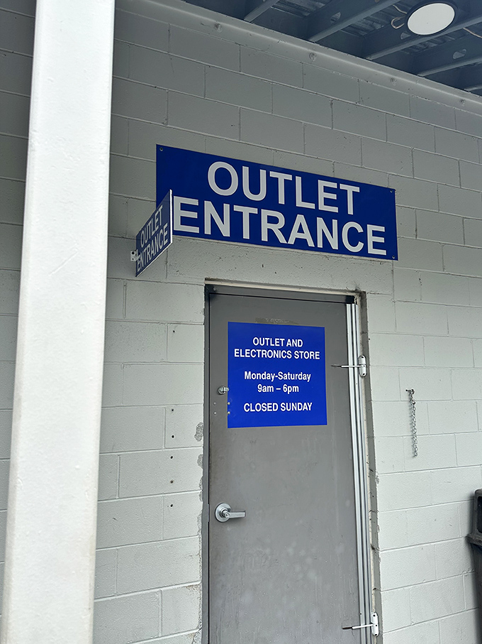The gateway to bargain paradise. This unassuming door might as well have "Abandon all retail pricing logic, ye who enter here" written above it.