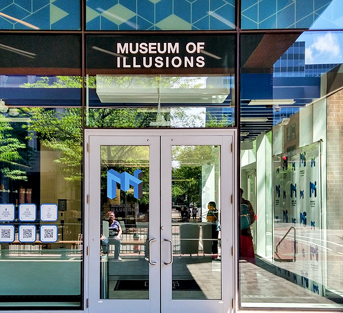 Step through these doors and leave your certainty behind. The Museum of Illusions welcomes visitors with a sleek entrance that serves as a portal to perceptual chaos.