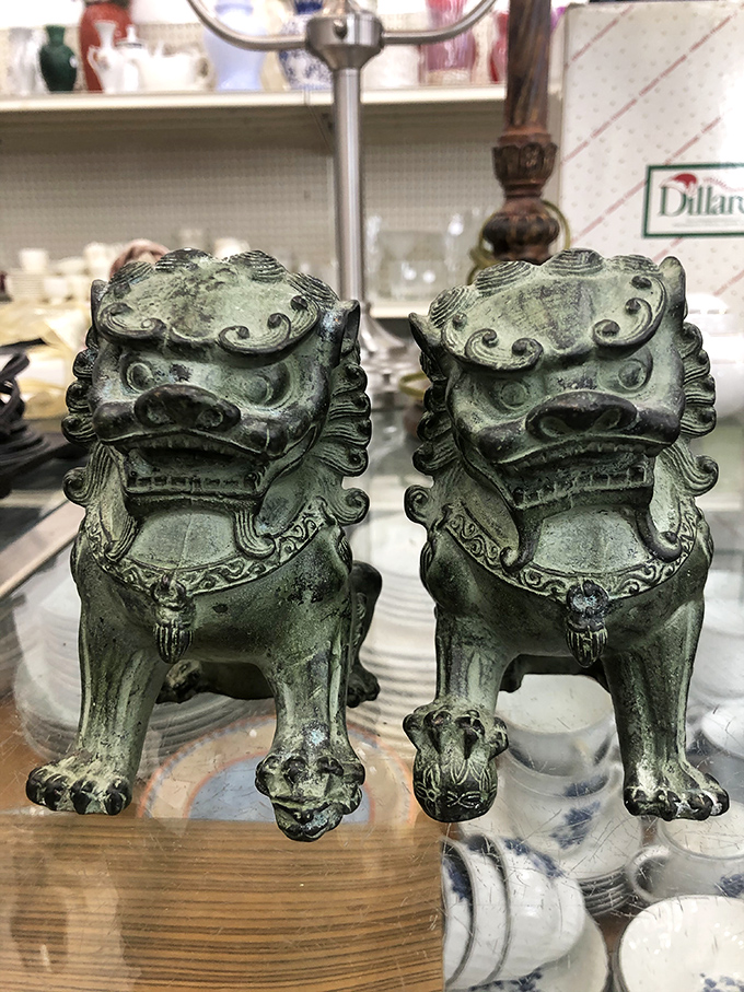 These jade-colored guardian lions aren't just decorative&mdash;they're watching to make sure you don't miss any bargains hiding in the corners.
