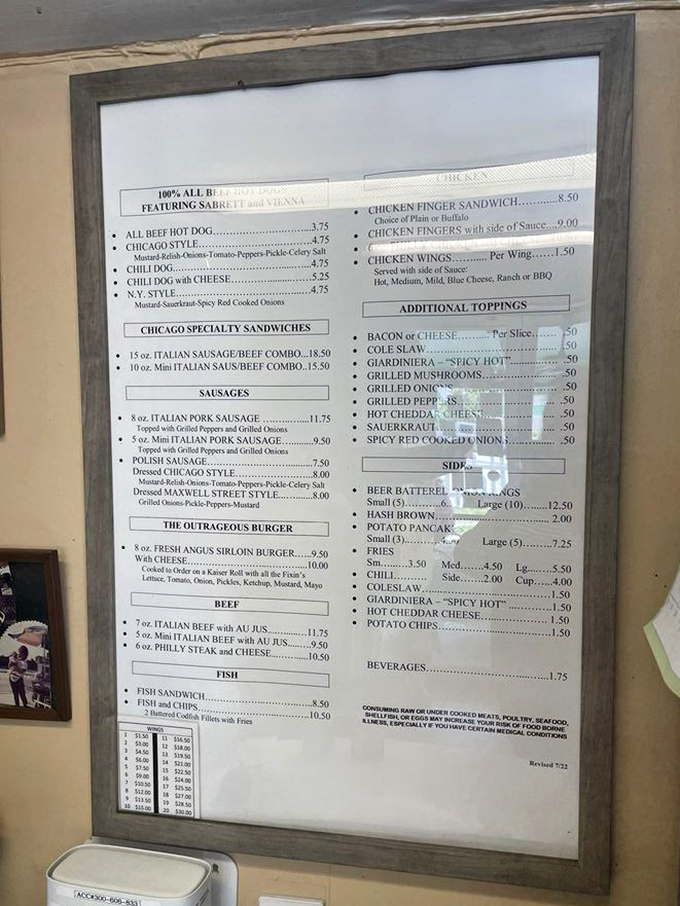 The menu board&mdash;a sacred text for hot dog pilgrims. No QR codes, no daily specials that change with the wind, just timeless classics waiting to be ordered.