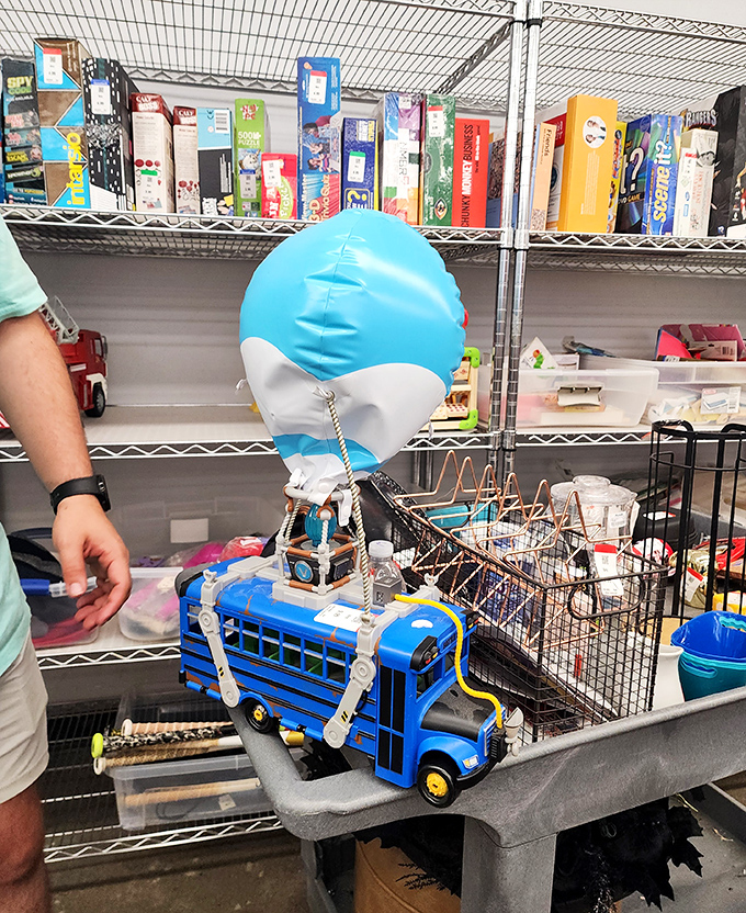 This whimsical blue school bus with hot air balloon might be the perfect metaphor for thrift shopping—unexpected, slightly bizarre, but utterly delightful.