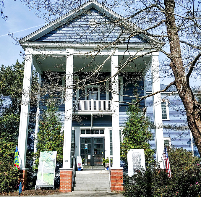 Franklin Square Gallery stands tall with those magnificent columns, like a Southern gentleman who's seen it all but still dresses up for Sunday dinner.