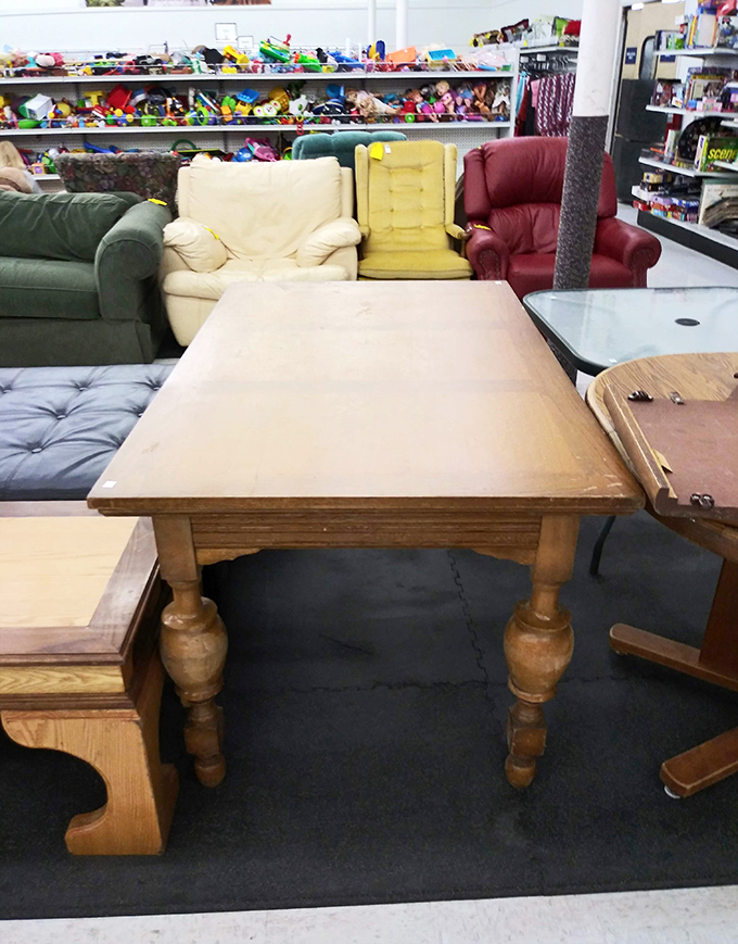 The living room lineup! These gently-used sofas and that solid wood table are just waiting for their second act in someone's home.