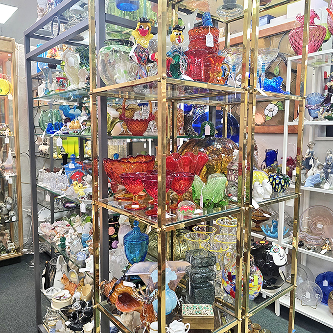 Colorful glass treasures catch the light like jewels in a dragon's hoard. That cranberry glass bowl? Your grandmother would approve.