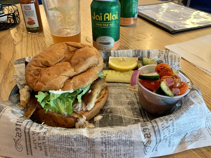 The legendary grouper sandwich in its natural habitat. Notice how the beer stands at respectful attention, knowing it's in the presence of greatness.
