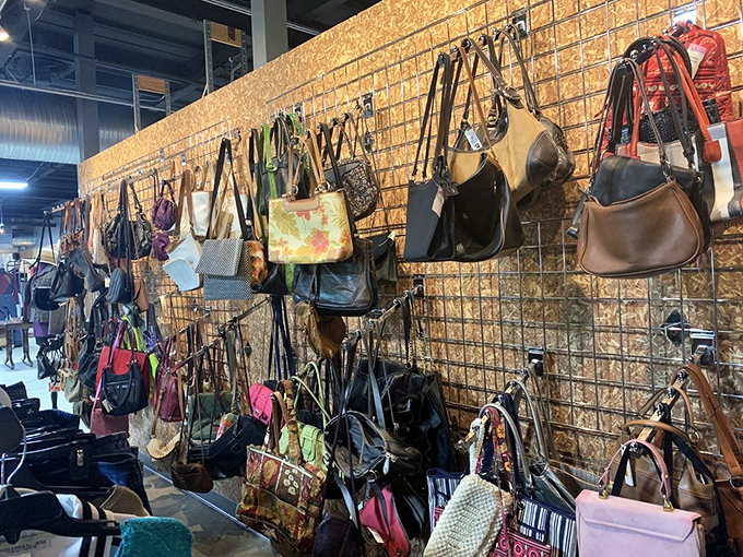 Behind every purse on this wall is a story, and one of them might become yours for pocket change.