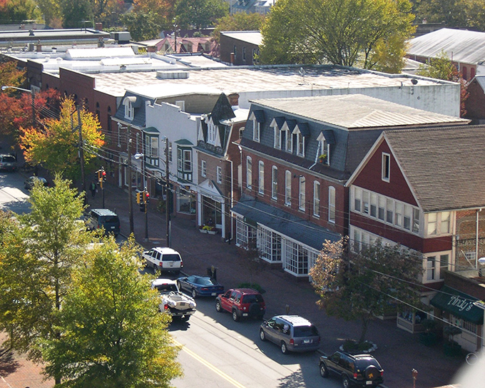 High Street's brick buildings stand shoulder-to-shoulder like old friends, their varied rooflines creating a skyline that's more charming than imposing.