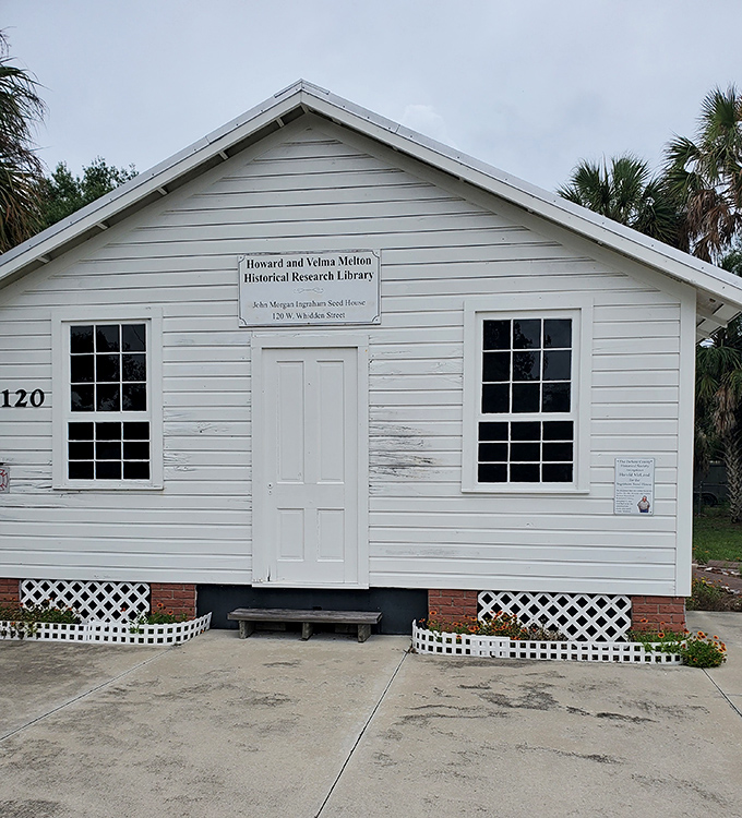 The Howard and Velma Melton Historical Research Library stands as a humble guardian of Arcadia's past, its white clapboard walls housing generations of stories.