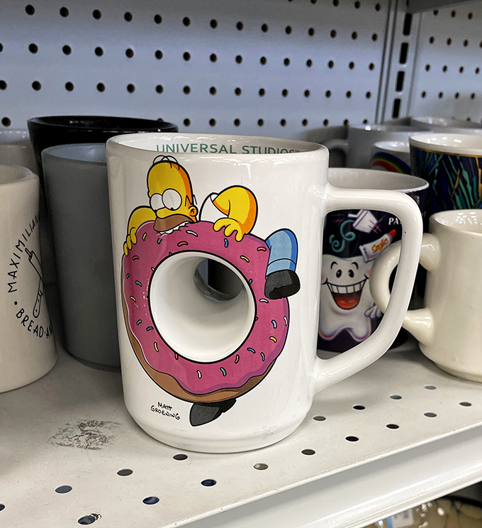 Homer Simpson's donut-themed mug perfectly captures the thrift store experience: there's a hole in the middle, but that's exactly what makes it special.