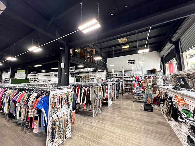 High ceilings and thoughtful organization transform what could be chaos into a thrifter's dream. Marie Kondo would approve of this joyful shopping space.