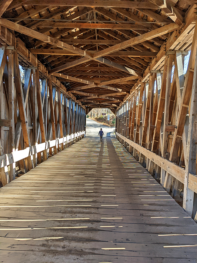 Walking through time &ndash; the Brown truss design creates a mesmerizing tunnel of wooden latticework that has sheltered travelers since 1871.