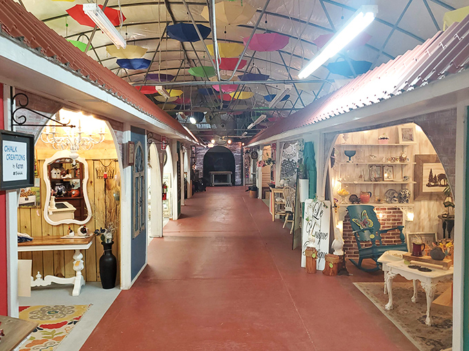 Walking this corridor feels like strolling through a vintage village, each doorway a portal to a different decorating dimension.