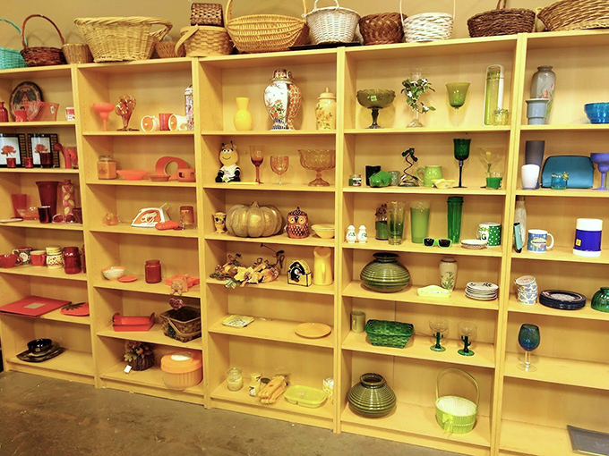 These color-coordinated shelves could teach Marie Kondo a thing or two. Vintage glassware and ceramics wait patiently for their second act in someone's curated collection.