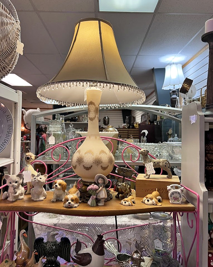 This elegant lamp holds court over a menagerie of ceramic companions, each figurine silently waiting to tell its story to the right collector.