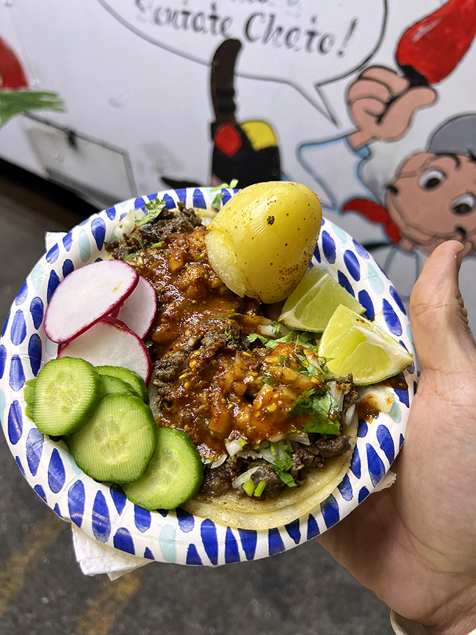 This isn't just a taco; it's a masterpiece on a paper plate. The lengua is tender enough to make you forget you're eating tongue.