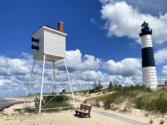 The lighthouse and its companion signal tower stand guard together&mdash;like maritime's odd couple, one tall and elegant, the other squat but equally important.