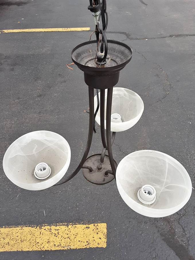 Even discarded light fixtures find new life here. One person's outdated chandelier becomes another's vintage statement piece—the circle of retail life in action.