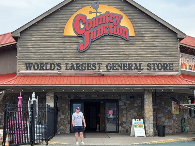 The stone entrance beckons shoppers like a country castle, complete with funnel cake stand &ndash; because shopping is officially a tourist attraction here.