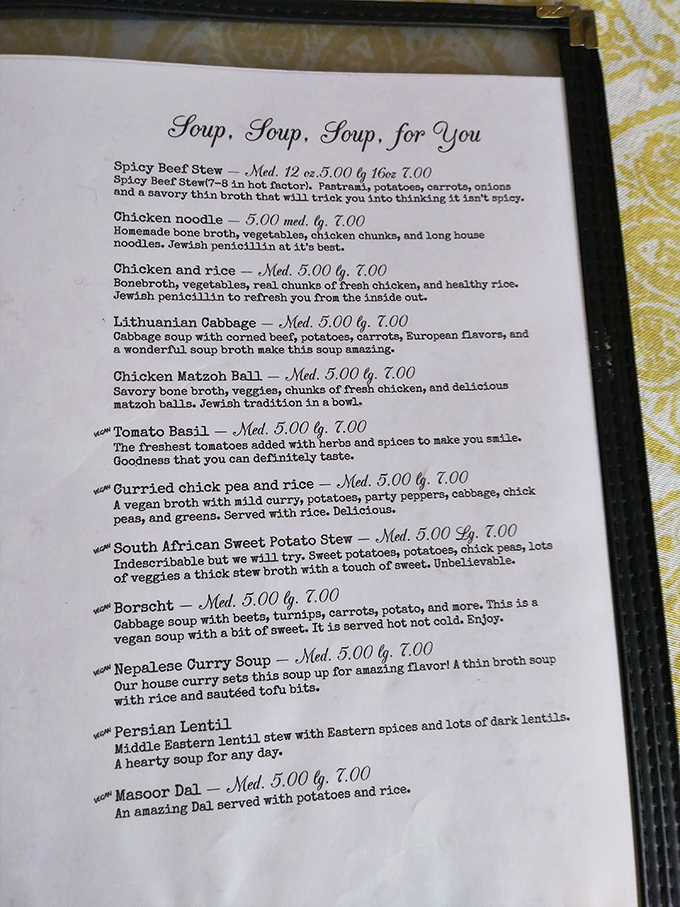 The soup menu reads like poetry for the soul-hungry. From matzo ball to borscht, each description promises a bowl of comfort that grandma would approve.