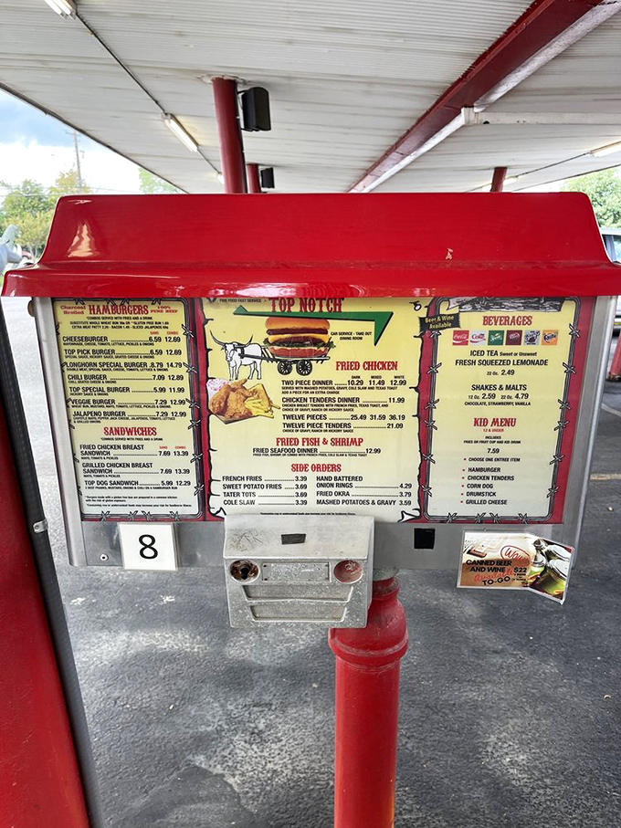 Order from your car like it's 1955, complete with menu boards that haven't forgotten what customer service means.