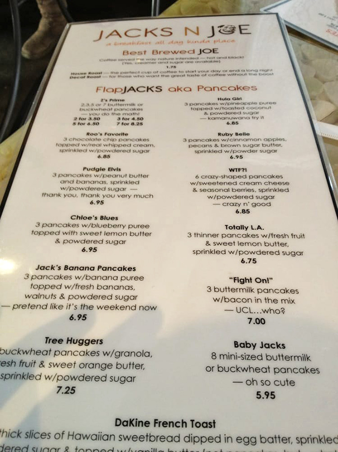 A menu that reads like poetry to hungry souls. Each cleverly named pancake creation tells a delicious story waiting to unfold.