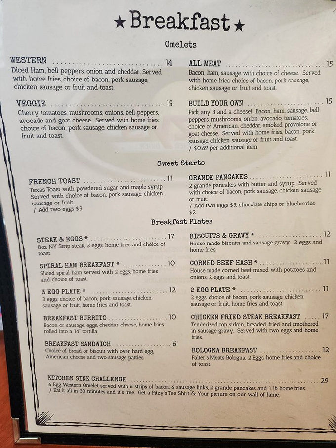 The breakfast menu reads like a love letter to morning indulgence &ndash; notice the "Kitchen Sink Challenge" daring brave souls at the bottom.