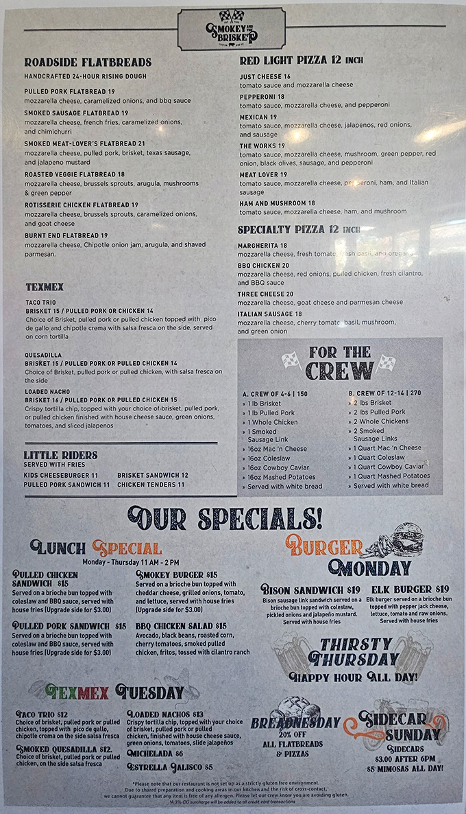 The menu reads like a love letter to smoked meat enthusiasts, with flatbreads, TexMex creations, and family-style feasts that'll make your group chat explode.