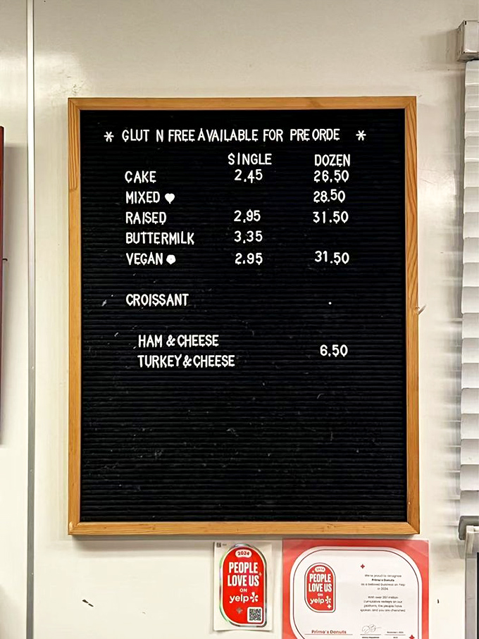 The menu board at Primo's speaks volumes in its simplicity: no fancy descriptions needed when your donuts have been perfecting happiness since 1956.