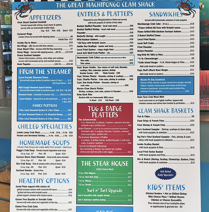 The menu is a treasure map to deliciousness, with colorful sections guiding you through a sea of options from steamer pots to she crab soup.