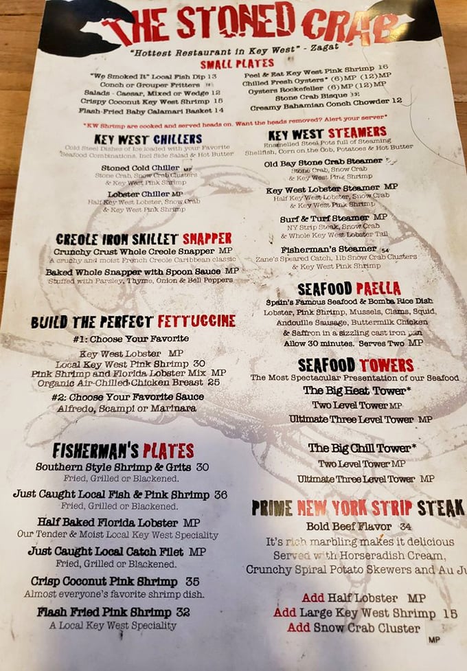 This menu isn't just a list—it's a treasure map to seafood nirvana. The "Seafood Towers" section alone could make Neptune himself salivate.