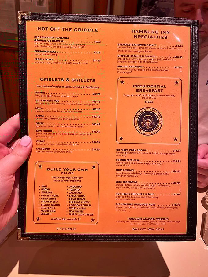 The menu reads like a presidential proclamation of comfort food classics. Notice the official seal on the "Presidential Breakfast"—democracy never tasted so good.