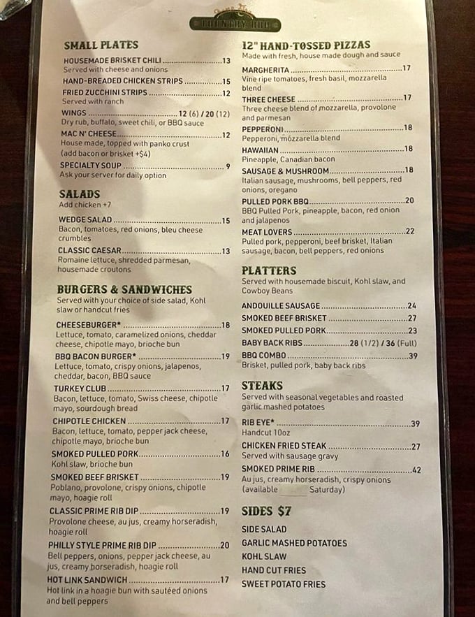 The menu reads like a love letter to smoked meats. Each description is a promise that your taste buds will remember long after the meal ends.